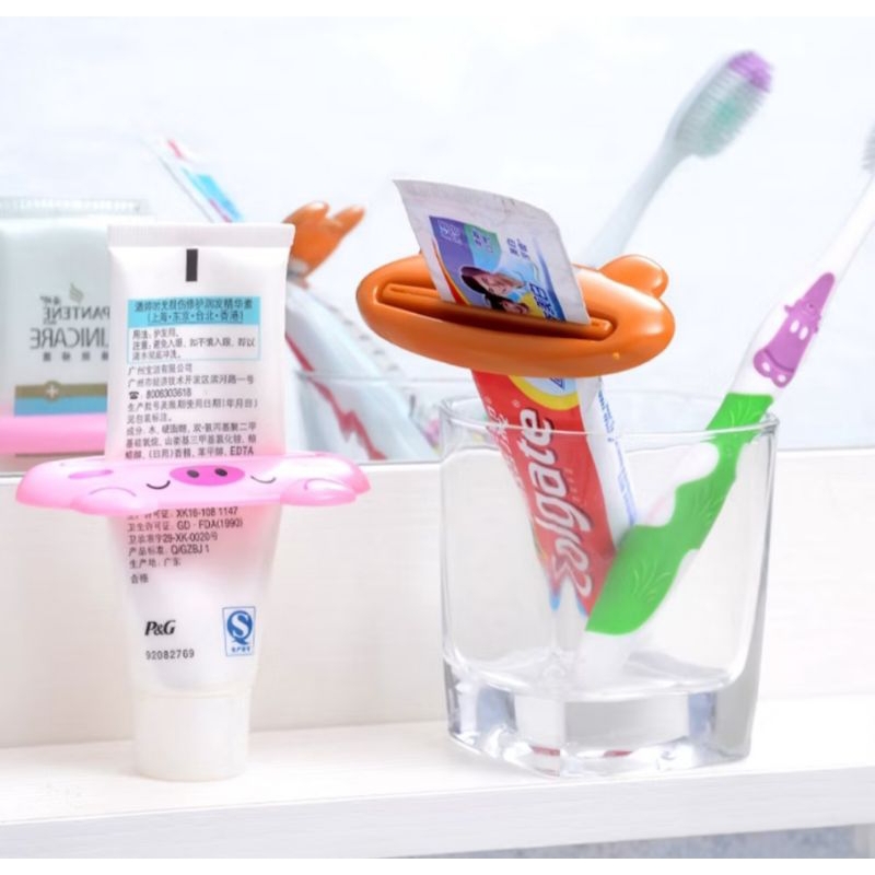Toothpaste tube squeezer cartoon toothpaste holder dispenser | Shopee ...