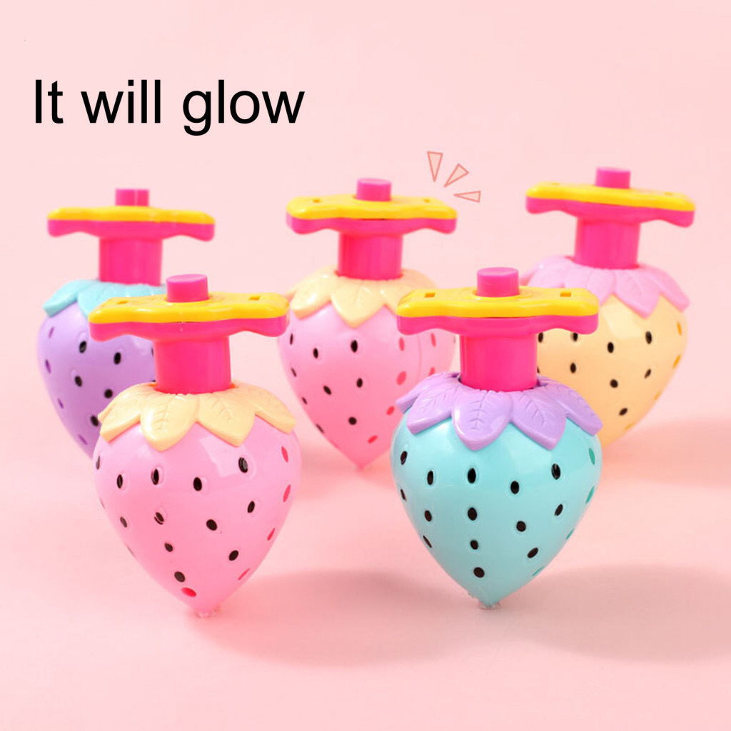 Strawberry shape toy spinning with light inside for playing outdoor ...