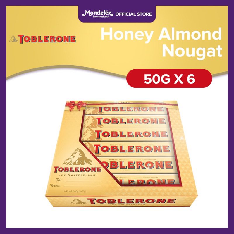 Toblerone Swiss Milk Chocolate Bar - with Honey Almond Nougat Snack ...