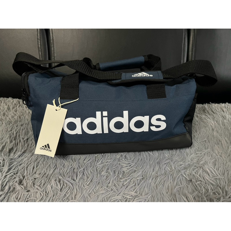 ESSENTIALS LOGO DUFFLE BAG CREW NAVY EXTRA SMALL - 14L | Shopee Philippines