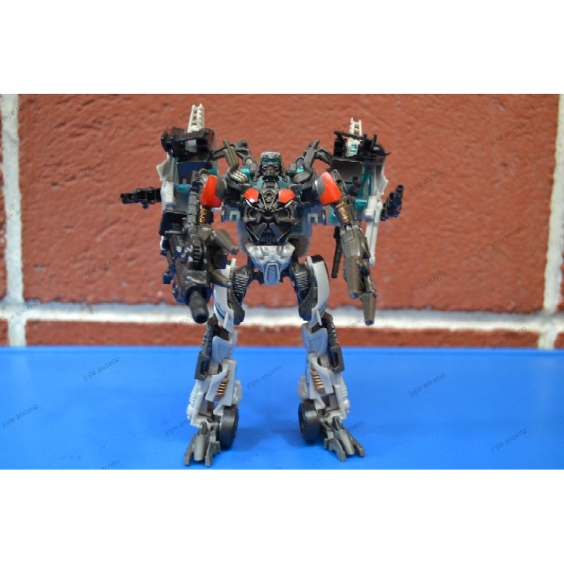 Transformers Dark of the Moon Deluxe Class Autobot Armor Topspin ...