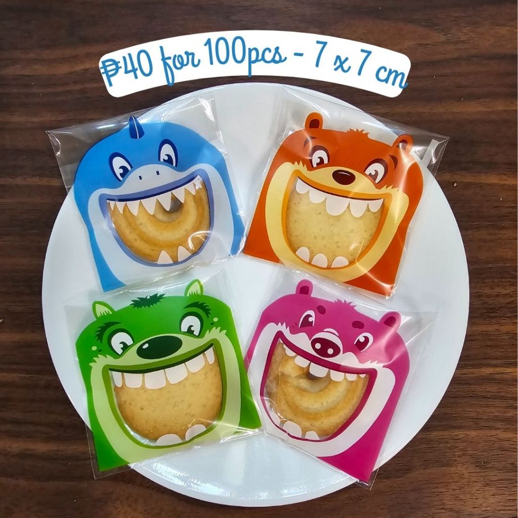 FP1983 (100PCS) 7x7 CM Colorful Monsters Halloween Candy Cookie Plastic ...