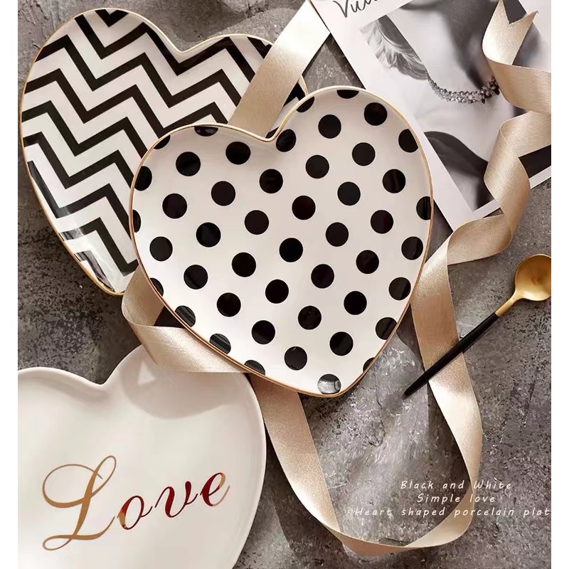 Creative geometric patterns of ceramic black and white heart-shaped ...