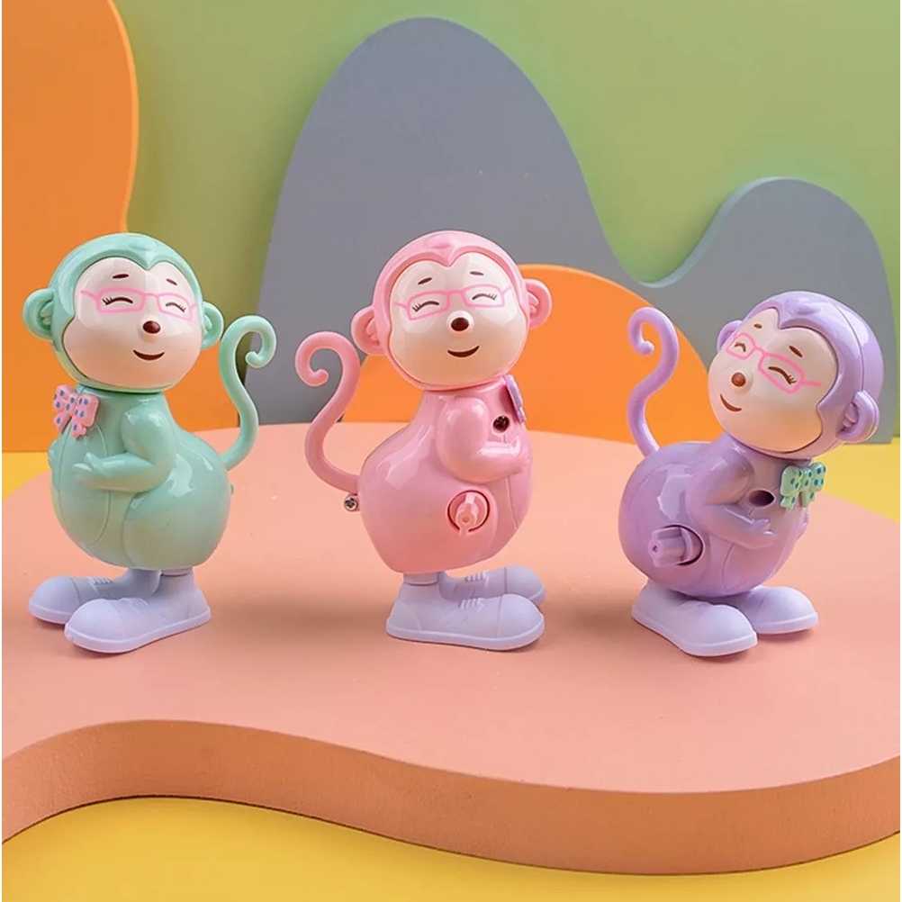 cute monkey/ winding clockwork toys cartoon animal monkey bouncing ...