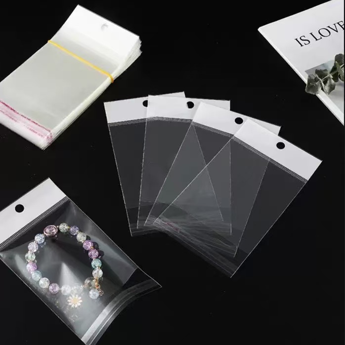 100pcs Transparent Self-Adhesive OPP Bags with Hang Hole for Retail ...