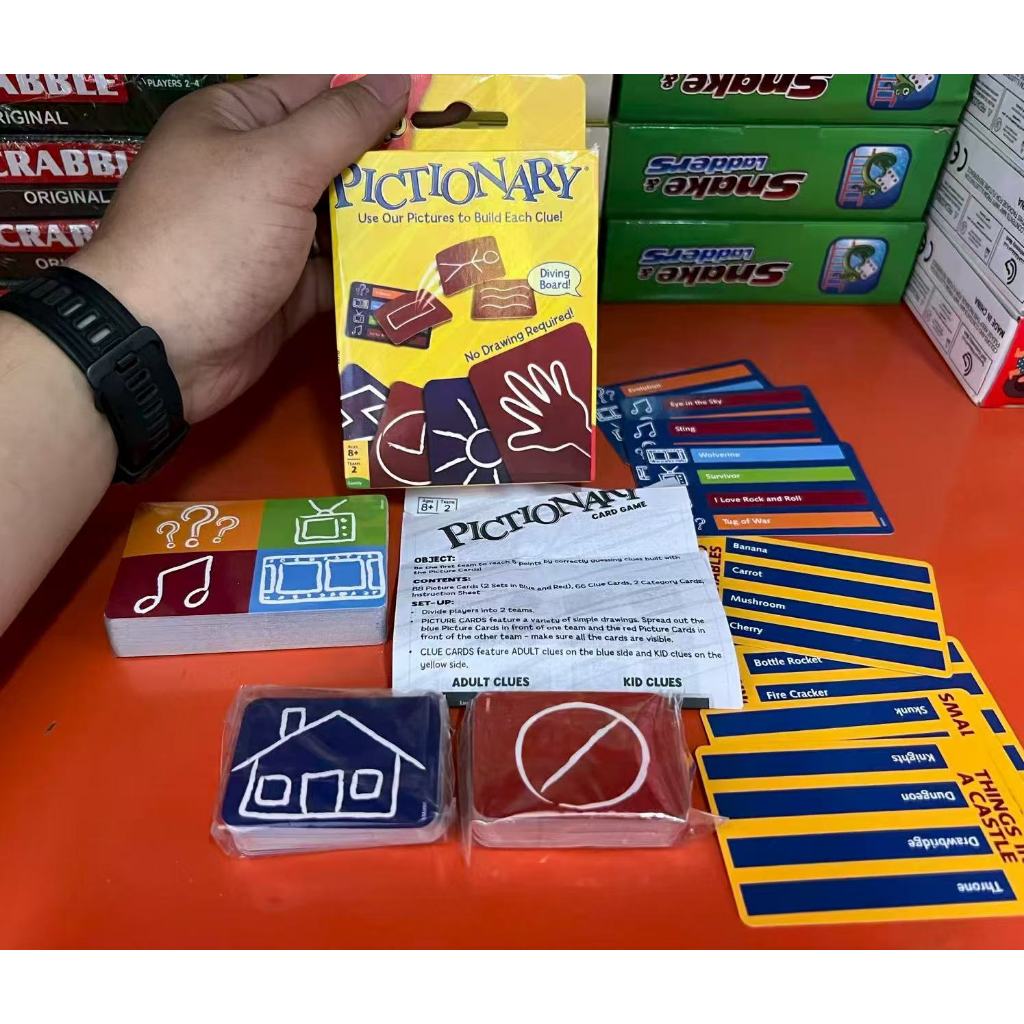 TYK children and adult pictionary card games use picture cards to build ...
