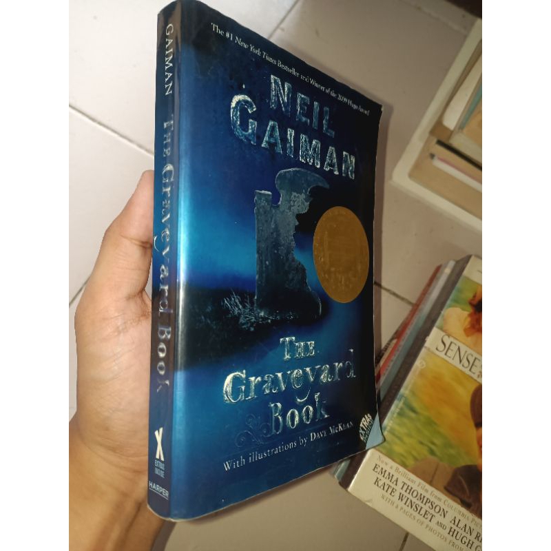 The Graveyard Book by NEIL GAIMAN | Shopee Philippines