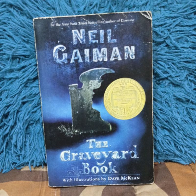 The graveyard book by neil gaiman | Shopee Philippines
