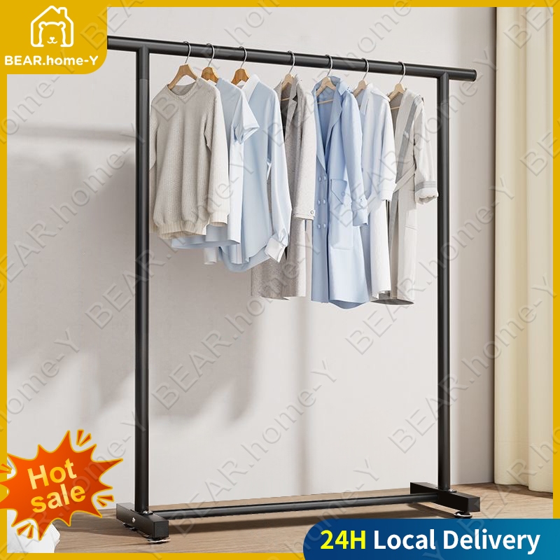 Bold clothes rack Floor standing single pole clothes rack Bedroom ...