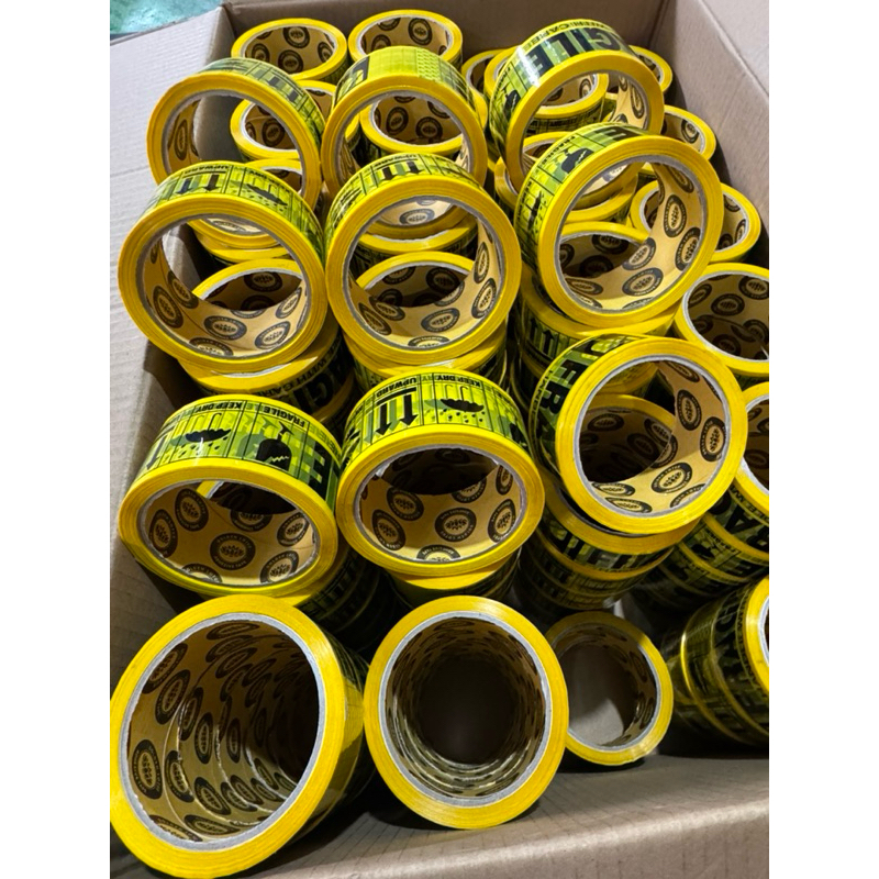 FRAGILE TAPE 2”x50m (yellow backing) SOLD PER PC | Shopee Philippines