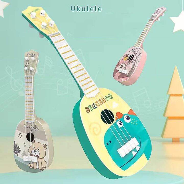 HomeCare Musical Instrument Mini Ukulele Guitar Toy Dinasour Design 4 ...
