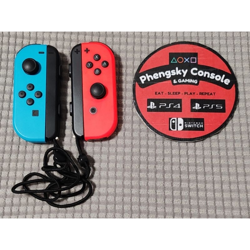Neon orange and blue original joycons nintendo switch w/joycon strap ...
