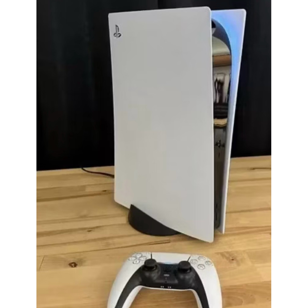 Sony PlayStation 5 (PS5) console with a DualSense wireless controller ...