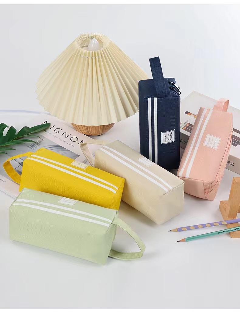 Student carrying a pen case. Large-capacity stationery storage pencil ...