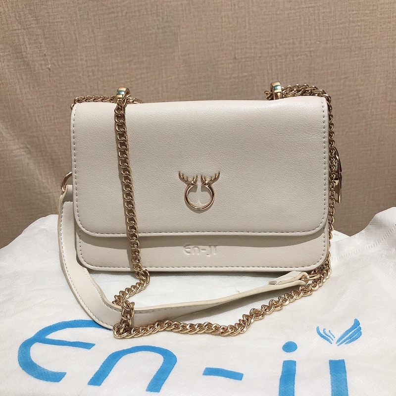 Preloved Enji Halmi slingbag (ivory) | Shopee Philippines