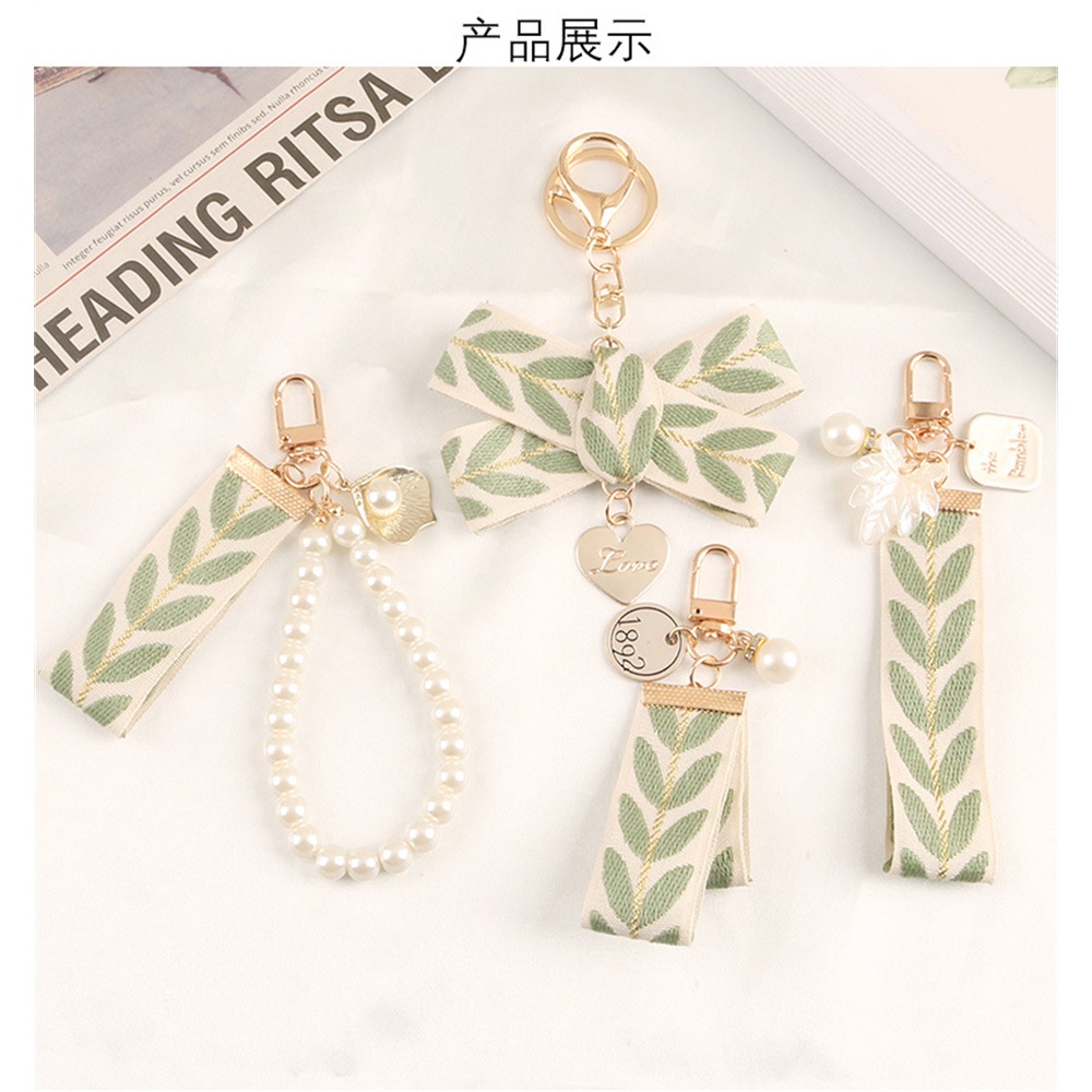 Fashion Leaf Shaped Braided Strap Keychain Pearl Heart Bow Pendant Key ...