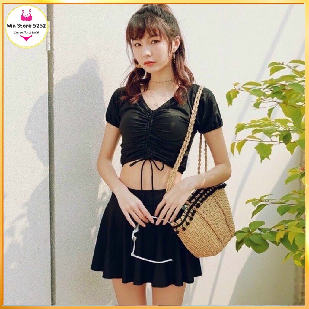 Women's swimsuit with stylish drawstring top and discreet flared skirt ...
