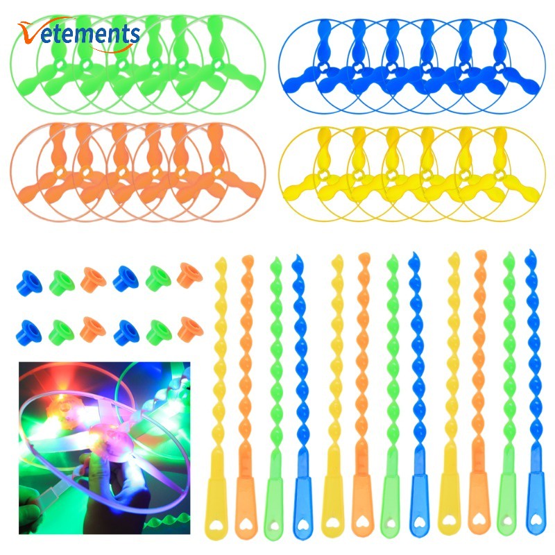Colorful Plastic Hand Push Flying Toy/ Luminous Twisty Flying Saucers ...