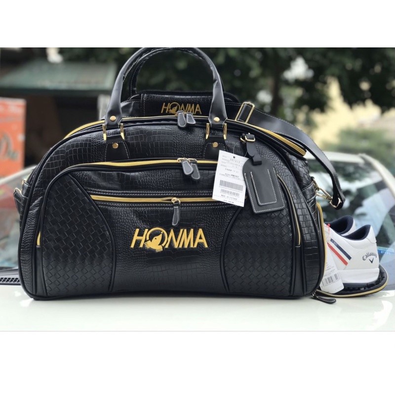 Honma grained leather golf bag - Honma golf bag for clothes and shoes ...