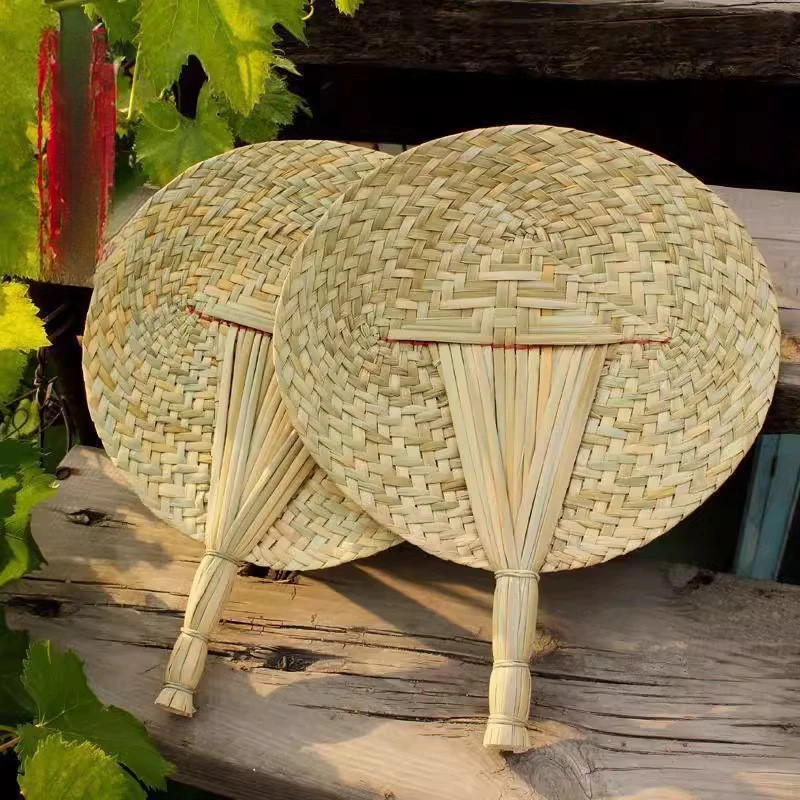 Handmade PU Grass Weaving: The large PU fan is a traditional hand-woven ...