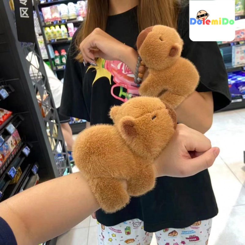 Little Red Book same style capi Bala crabing ring lying on the body ...