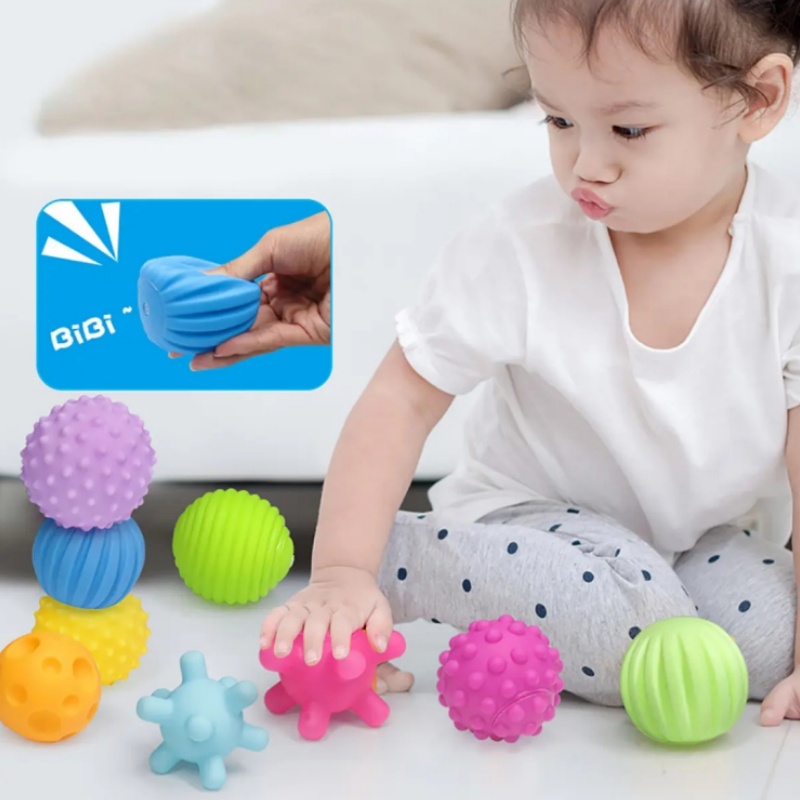 Infant toddler early education hand grasping ball sensory movement ...