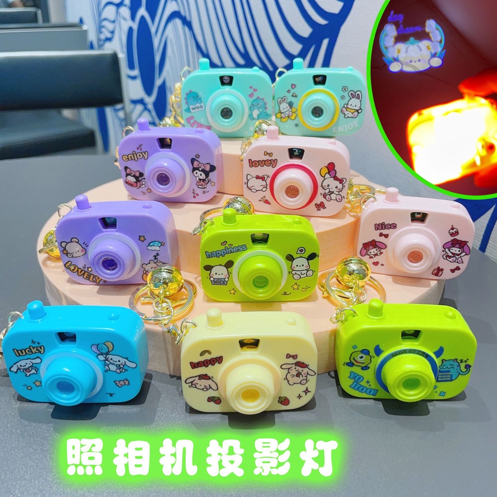 Souvenirs//Keychains // Sanrio // Small camera projection light ...