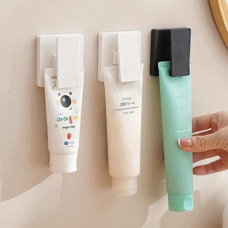 Self Adhesive Toothpaste Holder Rack Hanger Wall Hanging Clips Facial ...