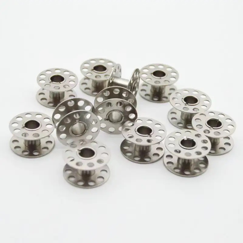10 ROUND HOLE bobbin used for HOUSEHOLD sewing machines used in the ...