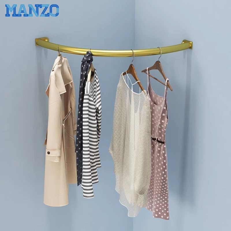 Hangers In The Corner Hanging Clothes Pole On The Bedroom Wall Leaning ...