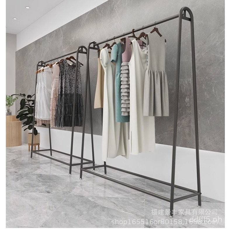 Clothing Store Women's Clothing Store Golden Dress Wedding Gown Hangers ...