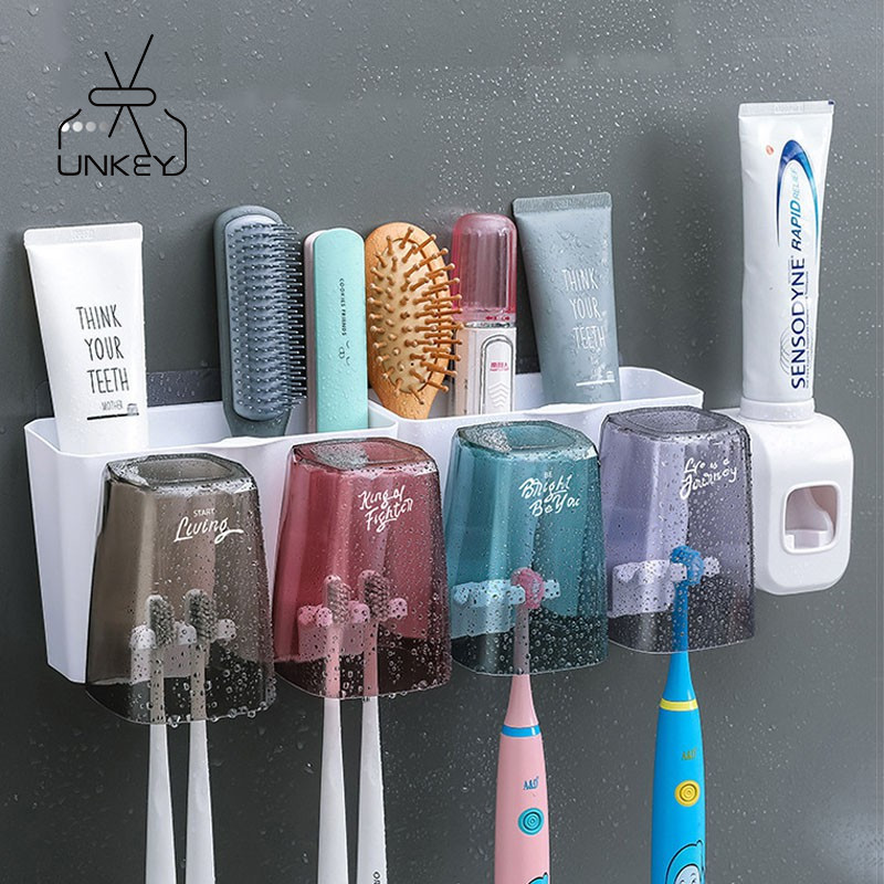 Toothbrush holder with toothpaste dispenser squeeze toothpaste Storage ...