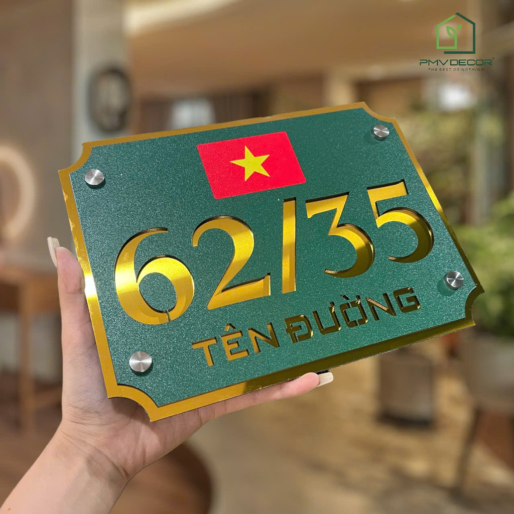 HOUSE NUMBER PLATE WITH Vietnamese FLAG SHAPE. Rough green background ...