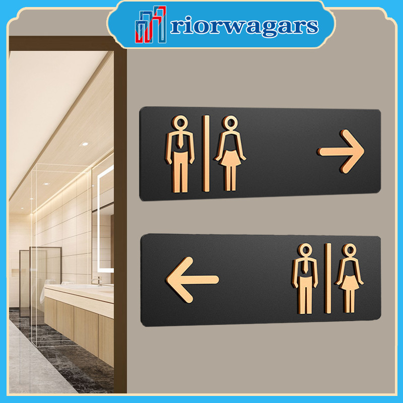 Men And Women Bathroom Signs Hotel To The Left And Right Restroom ...