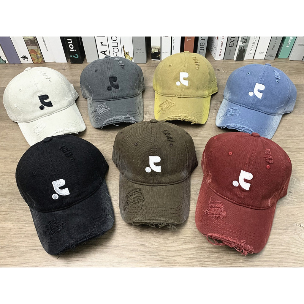 High quality baseball caps washed with water to make old and worn-out ...