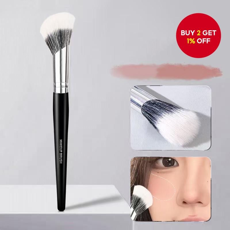 Slanted blush brush for applying blush seamlessly on cheeks, perfect ...