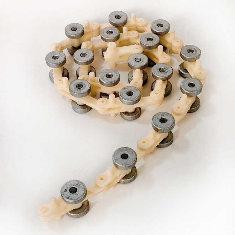 Handrails bring back a rotating chain escalator. The rotating chain has ...