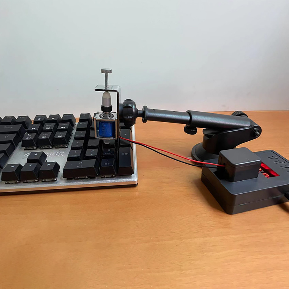 Timed Gaming Computer Replaces Finger Keys with Automatic Assistance of ...