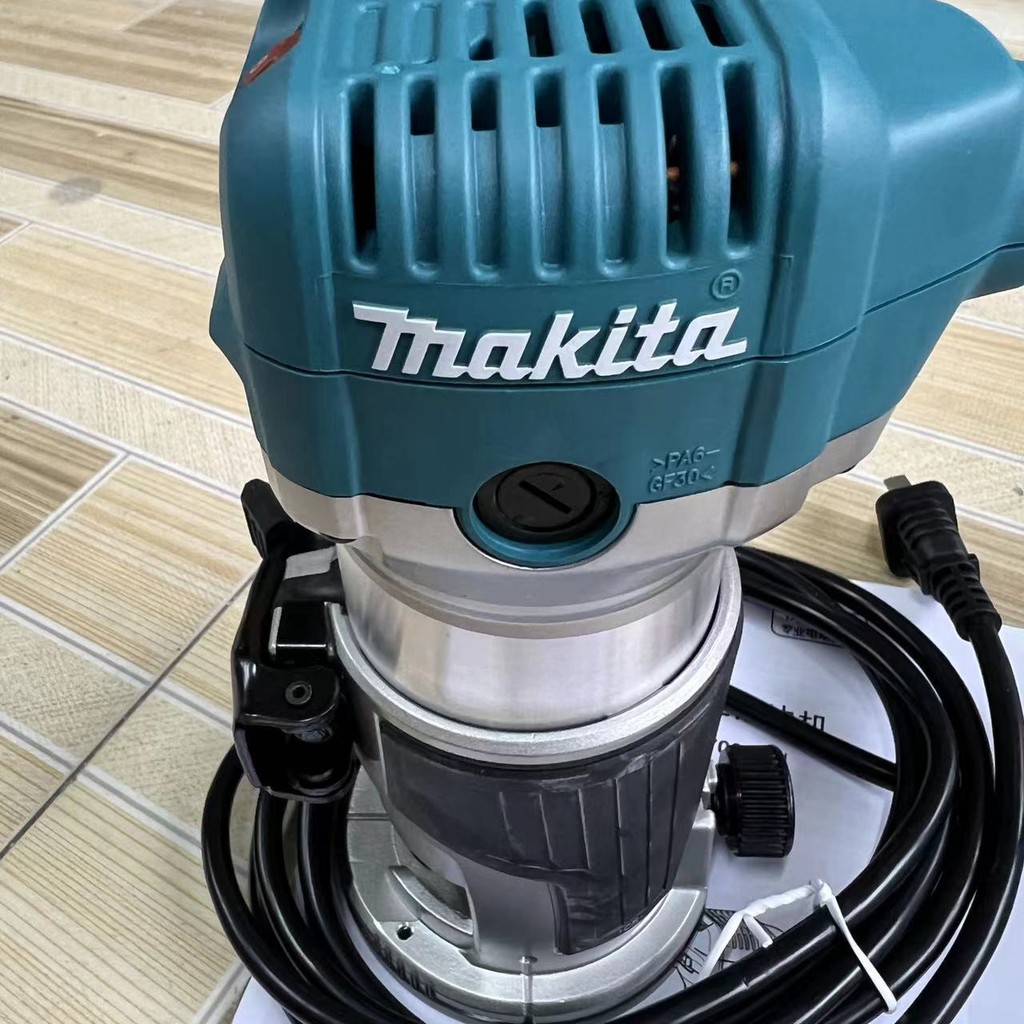 Makita RT0700C for woodworking edge trimming, speed control carving ...