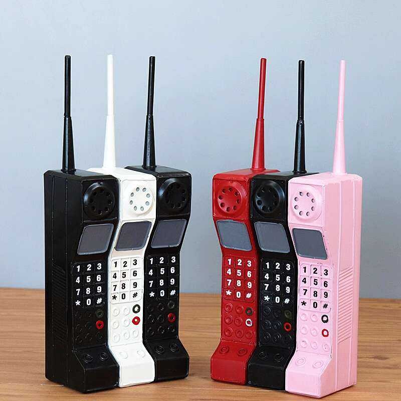Nostalgic old-fashioned mobile phone model from the 1980s, simulation ...
