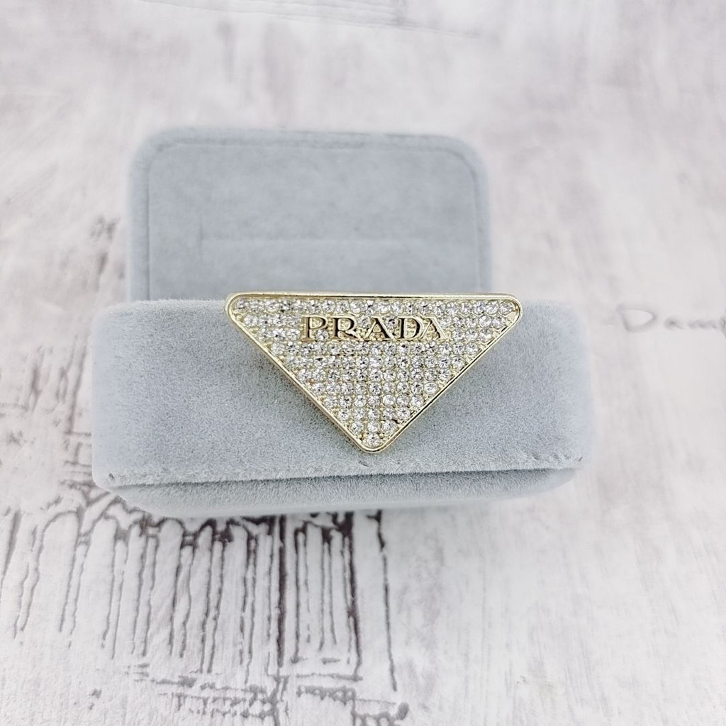PRADA P's Inverted Triangle Brooch Is High-quality, Full Of Diamonds ...