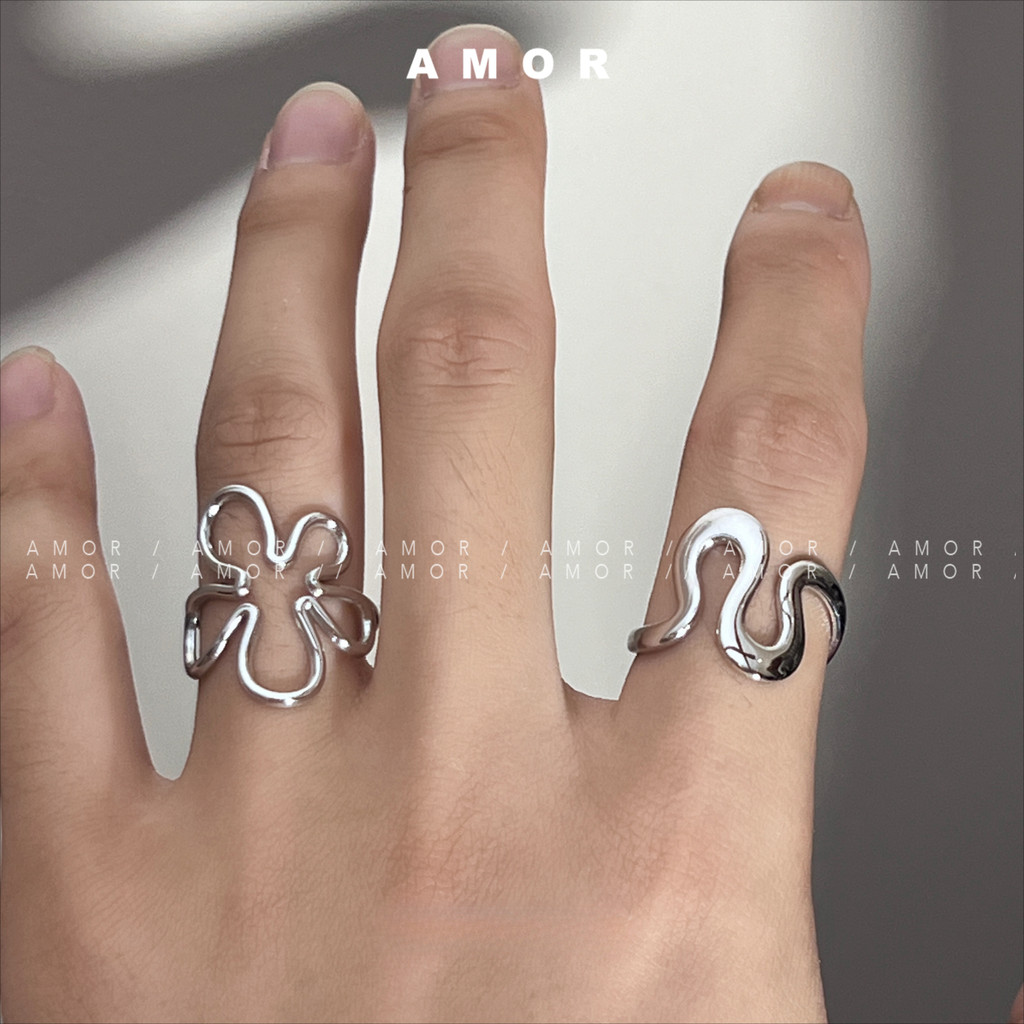 Irregular lines, geometric shapes, metal waves, flower shaped titanium ...