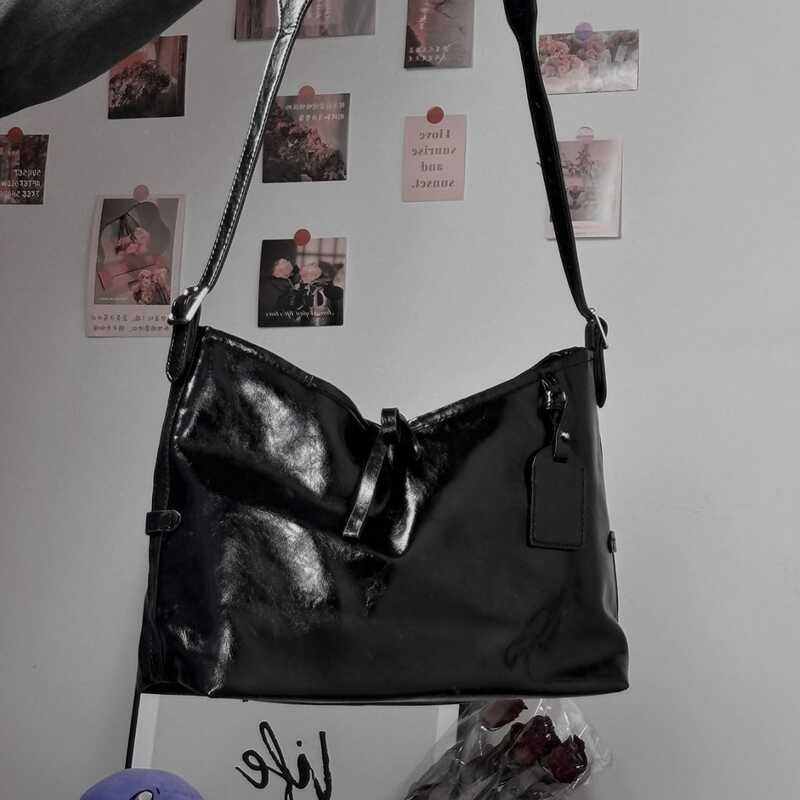 Cross shoulder may pinong butas na katad, 2024 bagong high-end leather ...