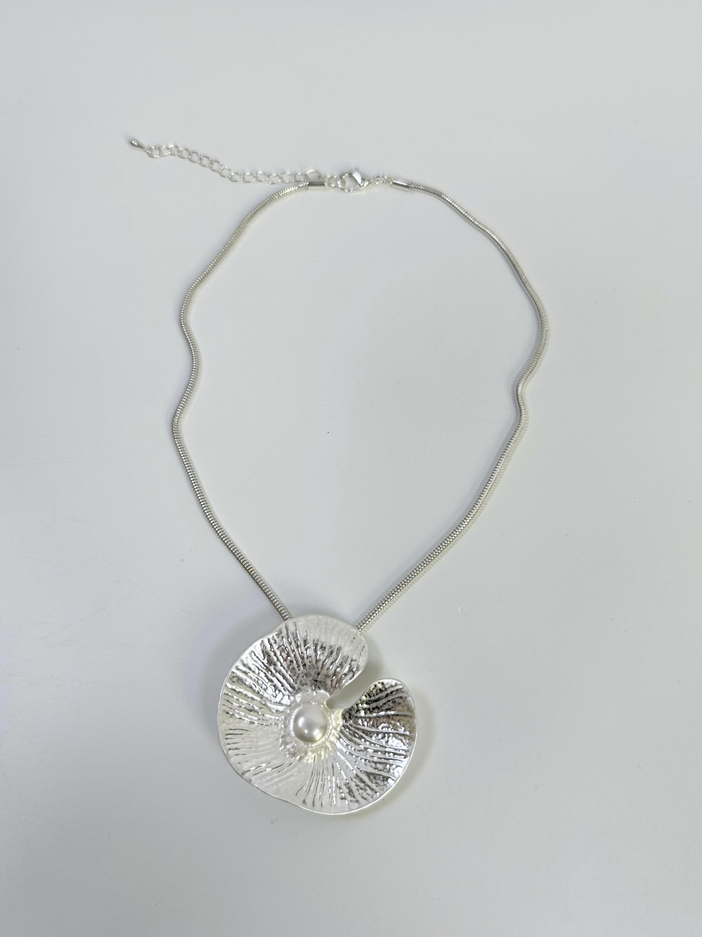 Silver three-dimensional texture metal flower pearl shape necklace ...