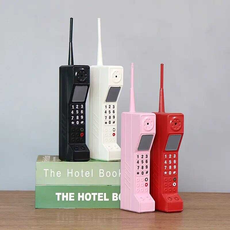 Nostalgic old-fashioned mobile phone model from the 1980s, simulation ...