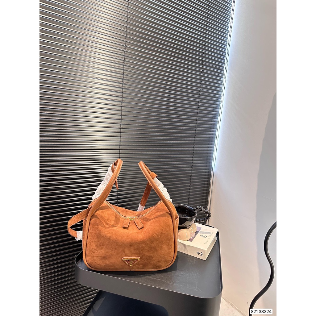 2025 Prada suede elf ear lunch box bag Elegant and simple bag design ...
