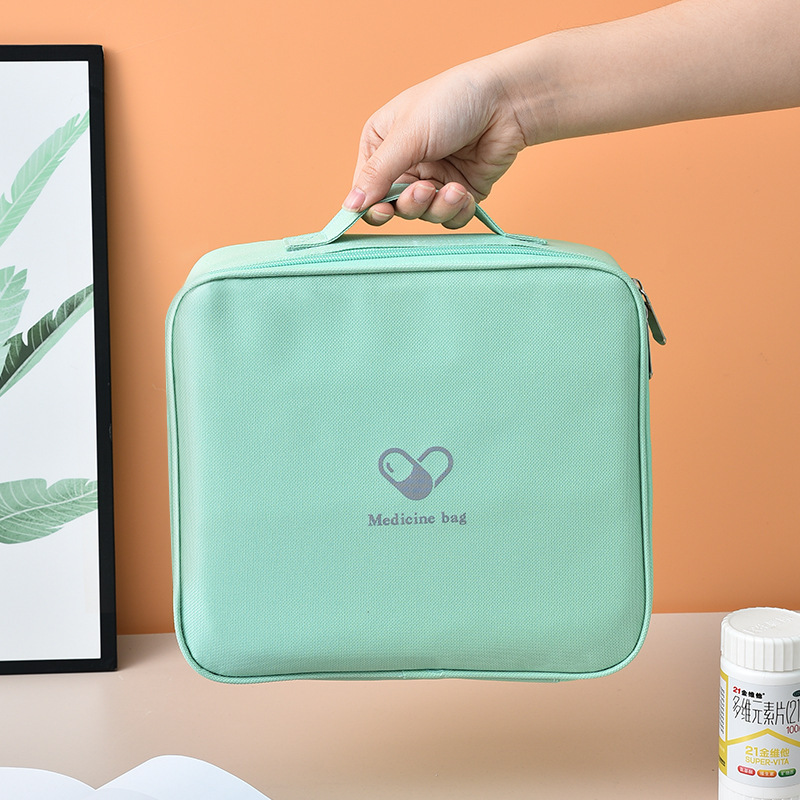 Green portable first aid kit Carry large capacity medicine storage kit ...