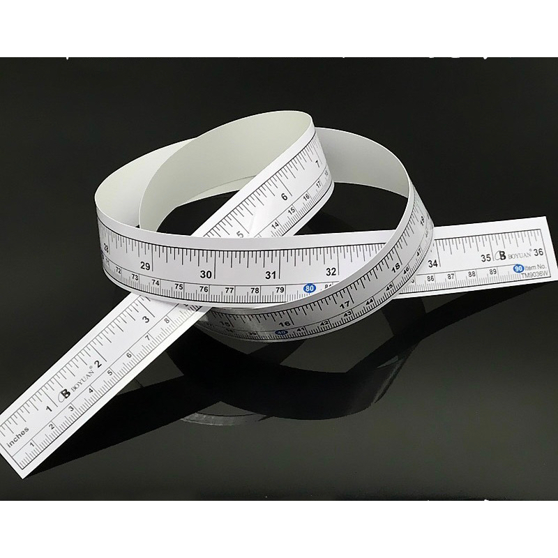 Tape Measure On The Front Of The Sewing Machine Table. Table Stickers ...