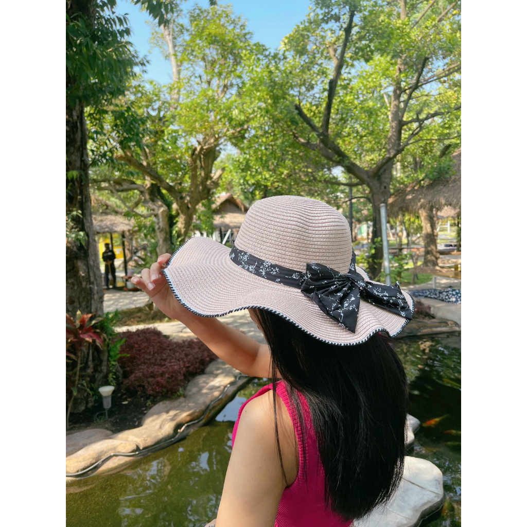 Wide-Brimmed Straw Hat With Wavy Waves And Bow Decoration From Thailand ...