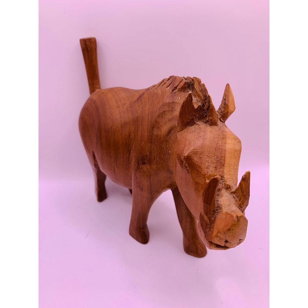 The Wood Carving Is A Rhino Not Completely Carved But Focuses On The ...